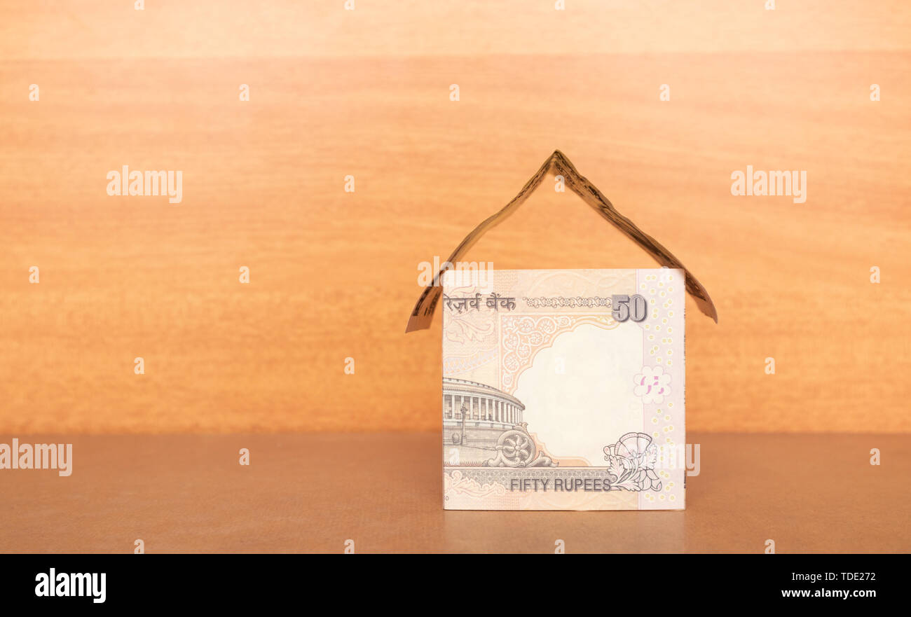 House made from the Indian currency with copy space, Concept of ...