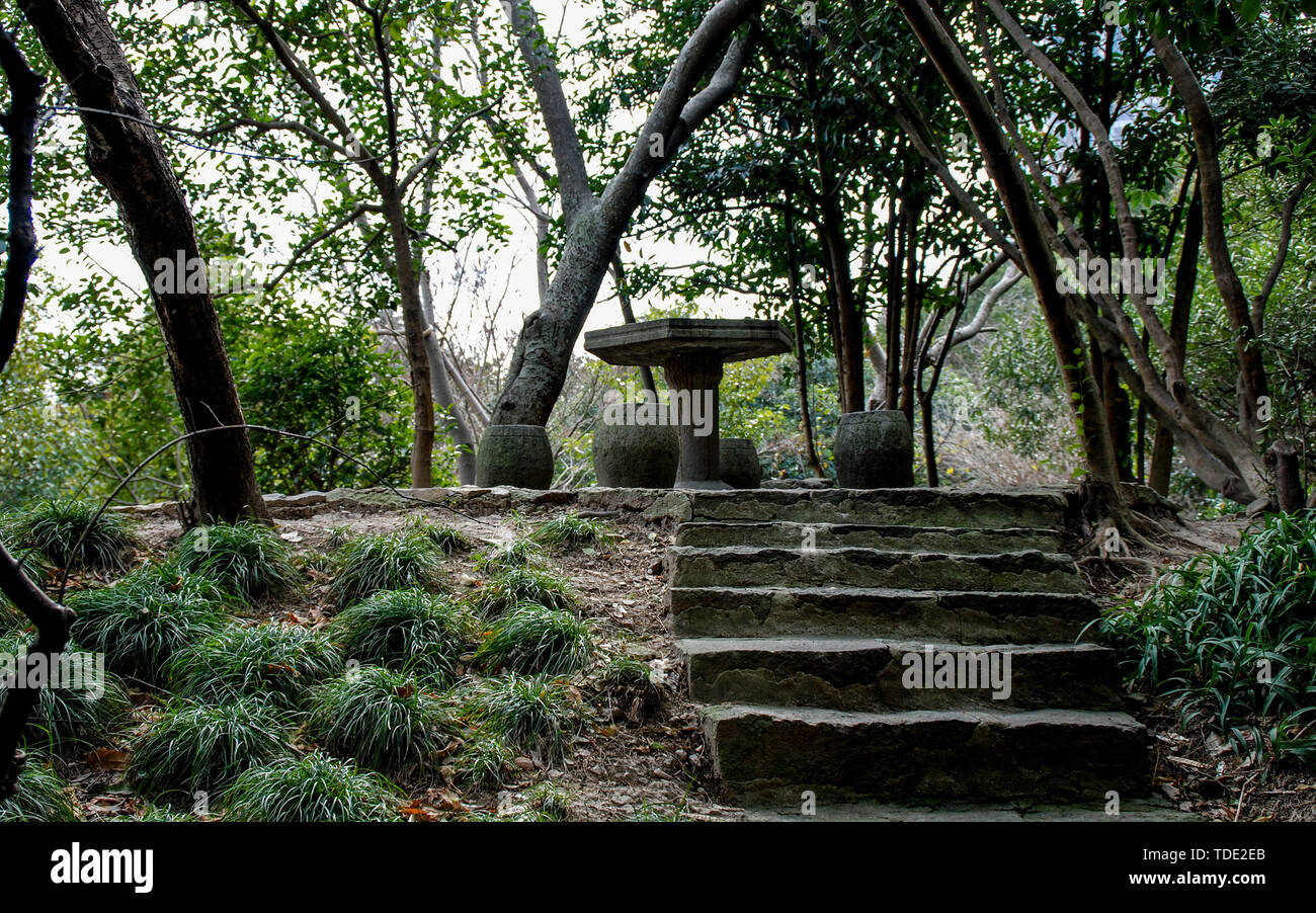 Stone table and stone bench Stock Photo - Alamy