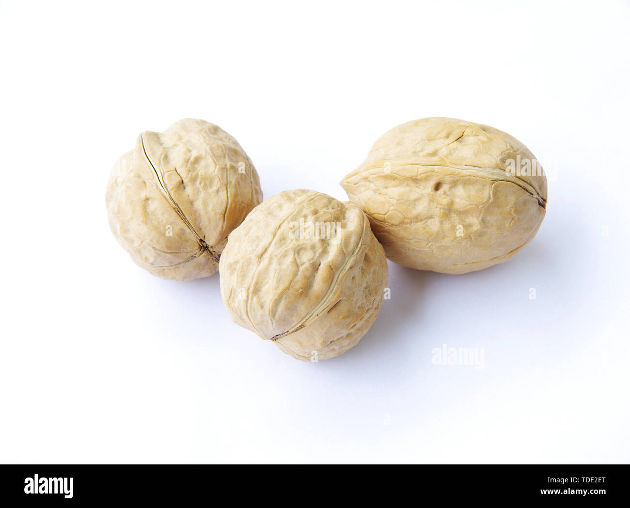 Walnuts in there shells Cut Out Stock Images & Pictures - Alamy