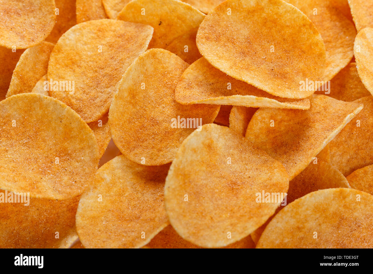 crispy potato chips snack texture background Stock Photo - Alamy