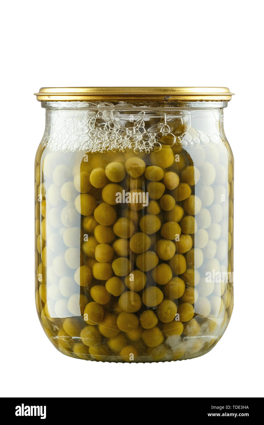 Green peas in glass jar isolated on white Stock Photo - Alamy