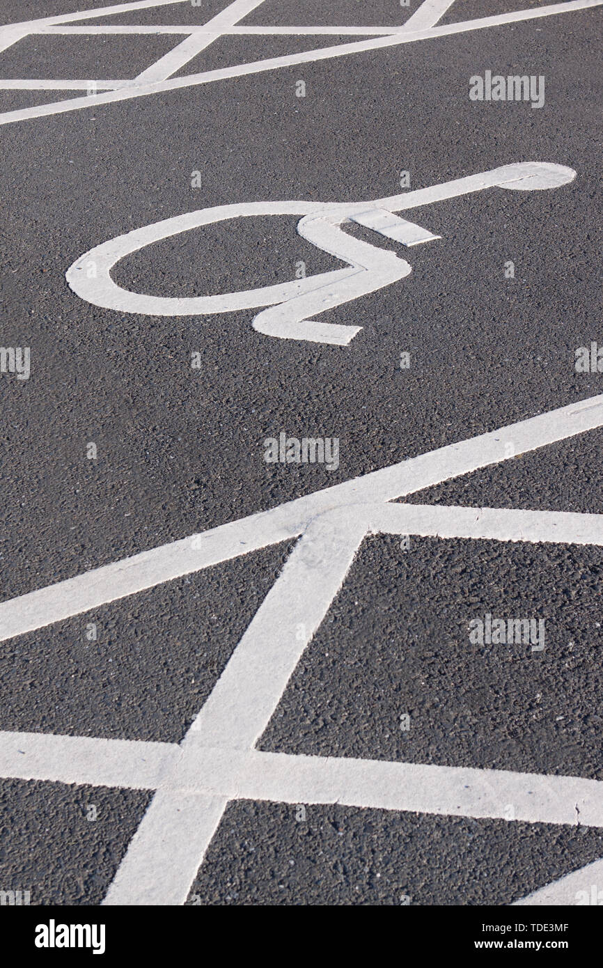 Disabled parking space painted on the ground Stock Photo - Alamy