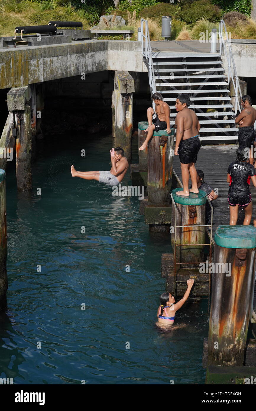 Kids jumping in the sea hi-res stock photography and images - Alamy