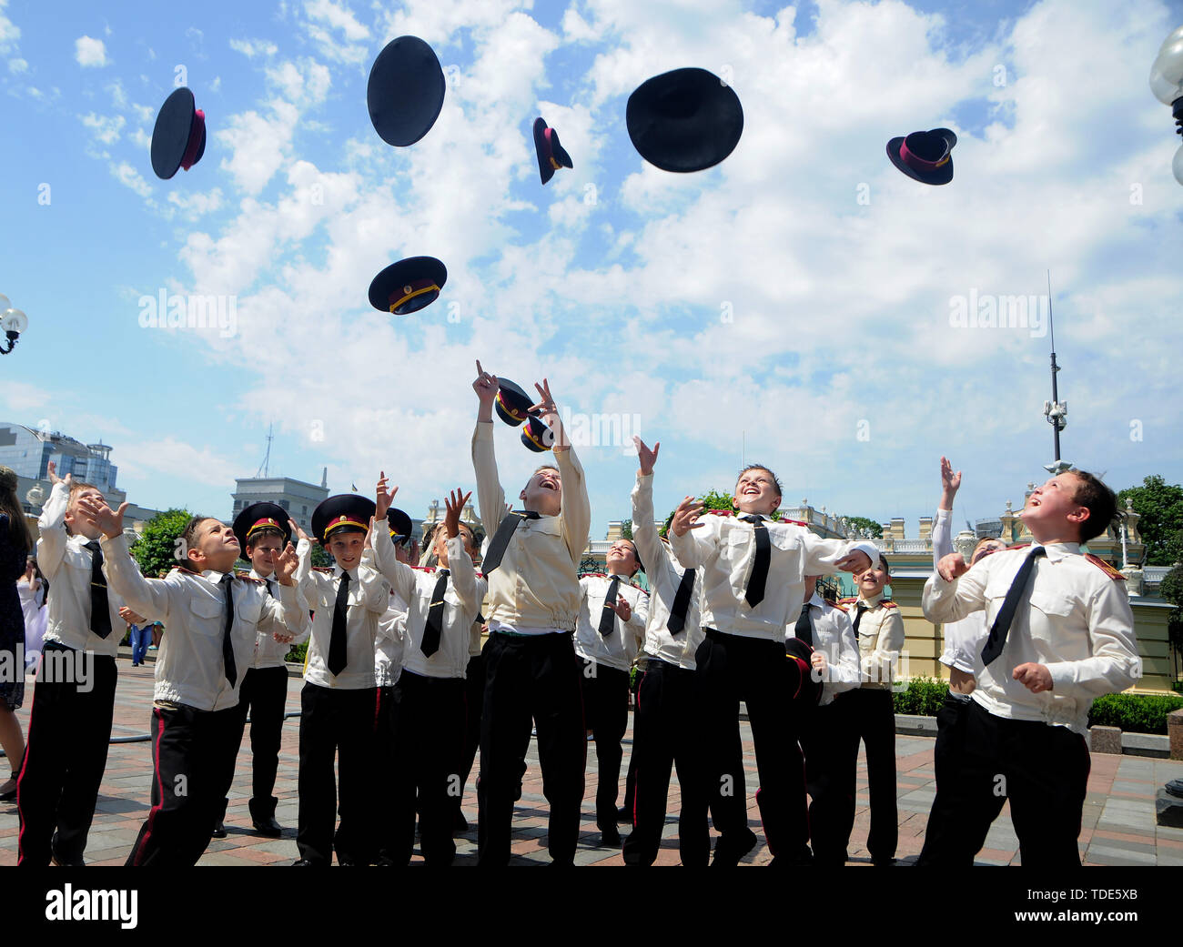 Cadets throw their caps during the ceremony. Holiday-graduation ...