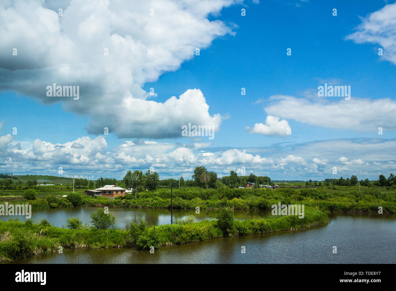 The sky is gorgeous, the earth is vast Stock Photo - Alamy