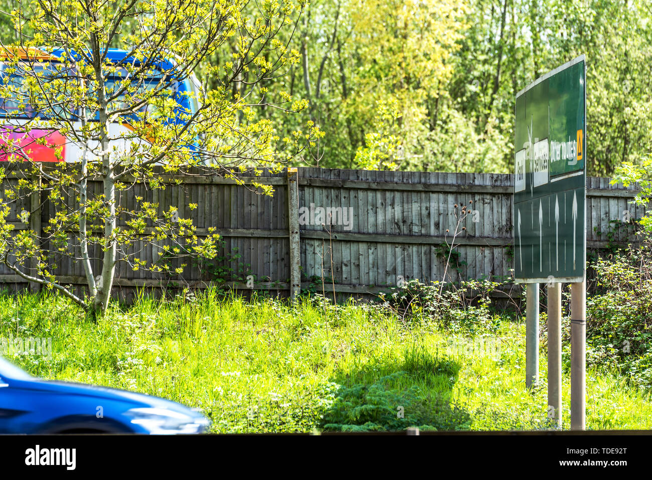 uk motorway directional sign with car and bus in front of it Stock ...