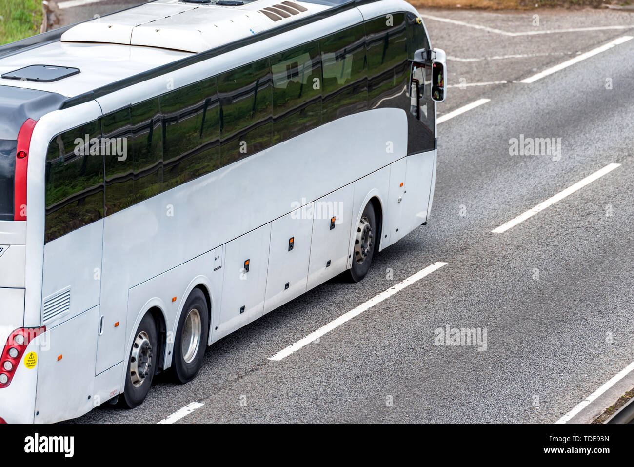 white bus coach on uk motorway in fast motion Stock Photo - Alamy