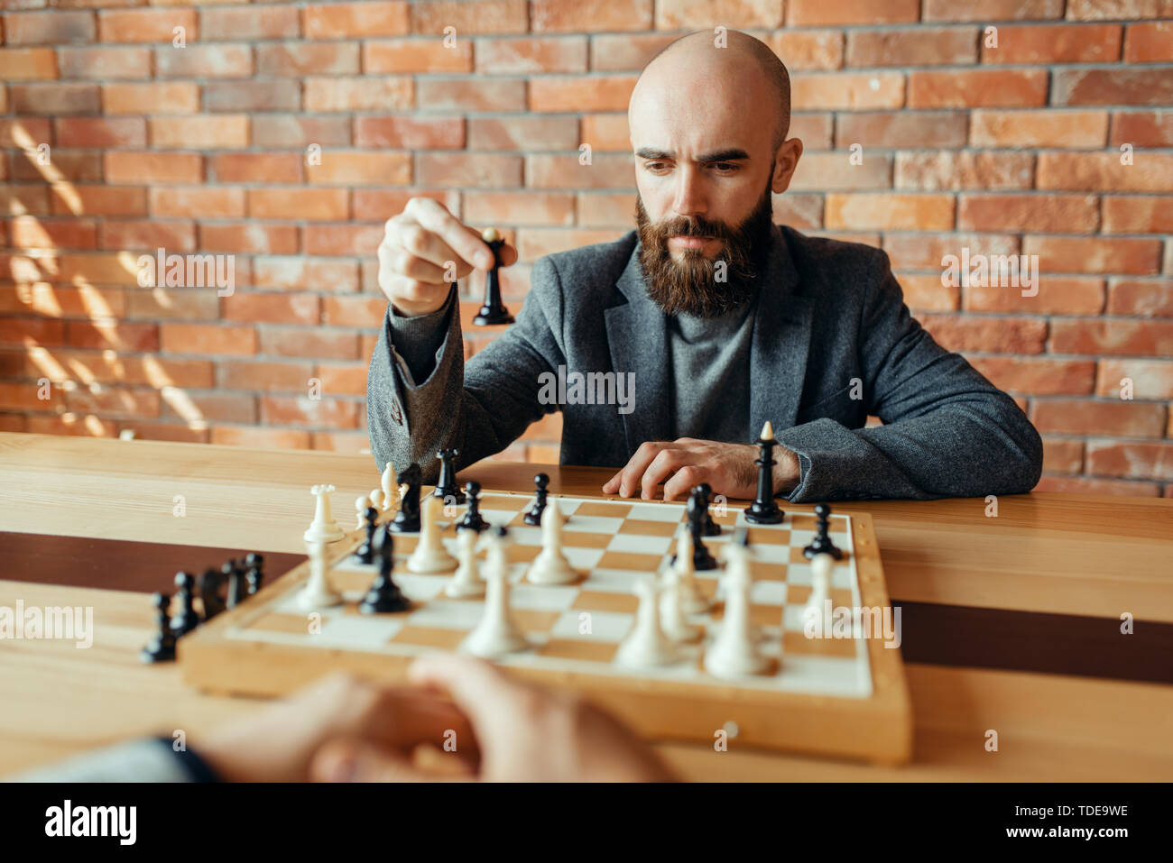 Black person playing chess hi-res stock photography and images - Alamy