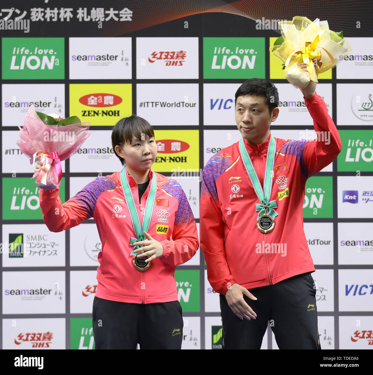 Sapporo, Japan. 15th June, 2019. Xu Xin (R) and Zhu Yuling of China ...