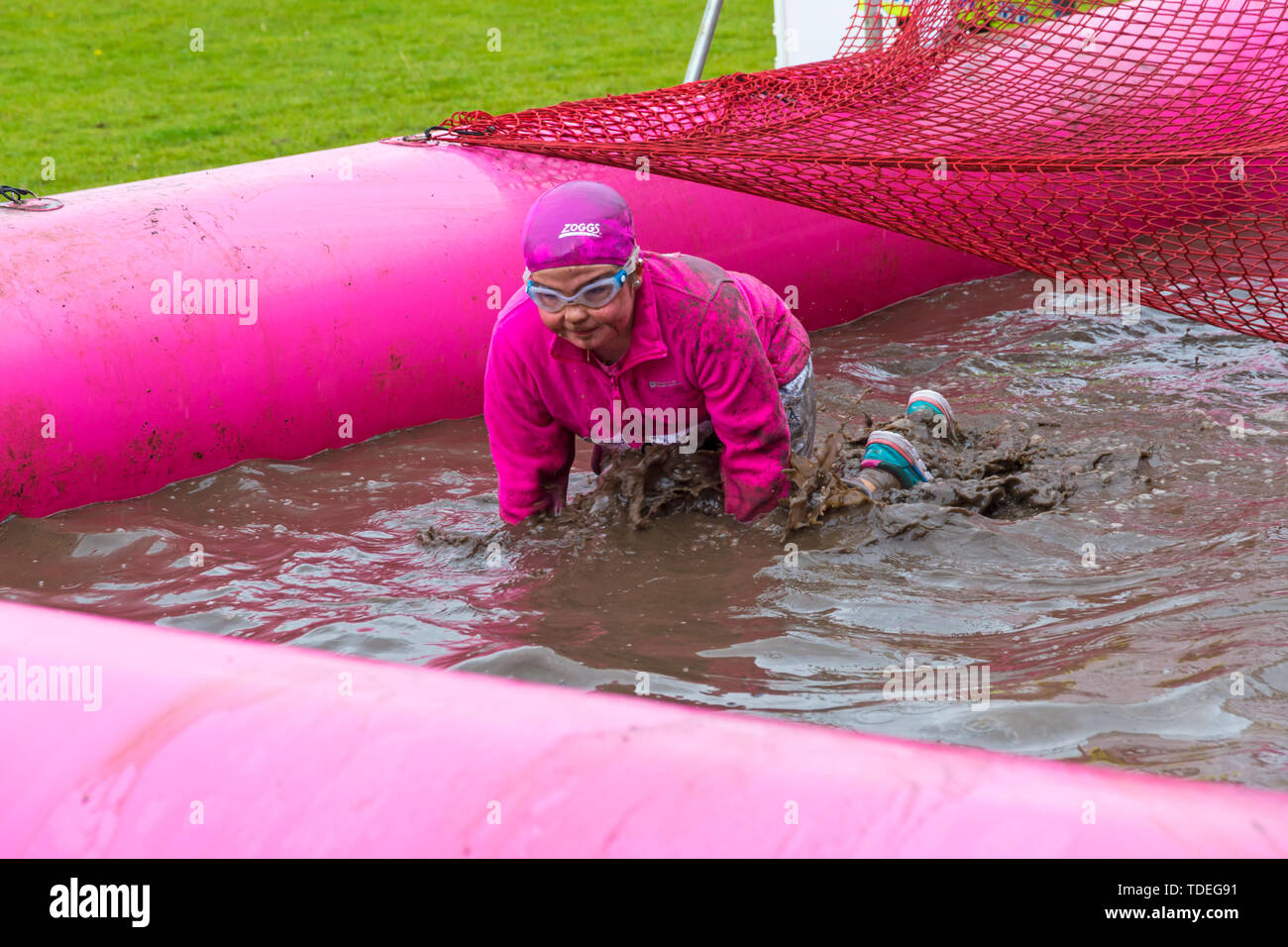Mud covered children race hi-res stock photography and images - Alamy