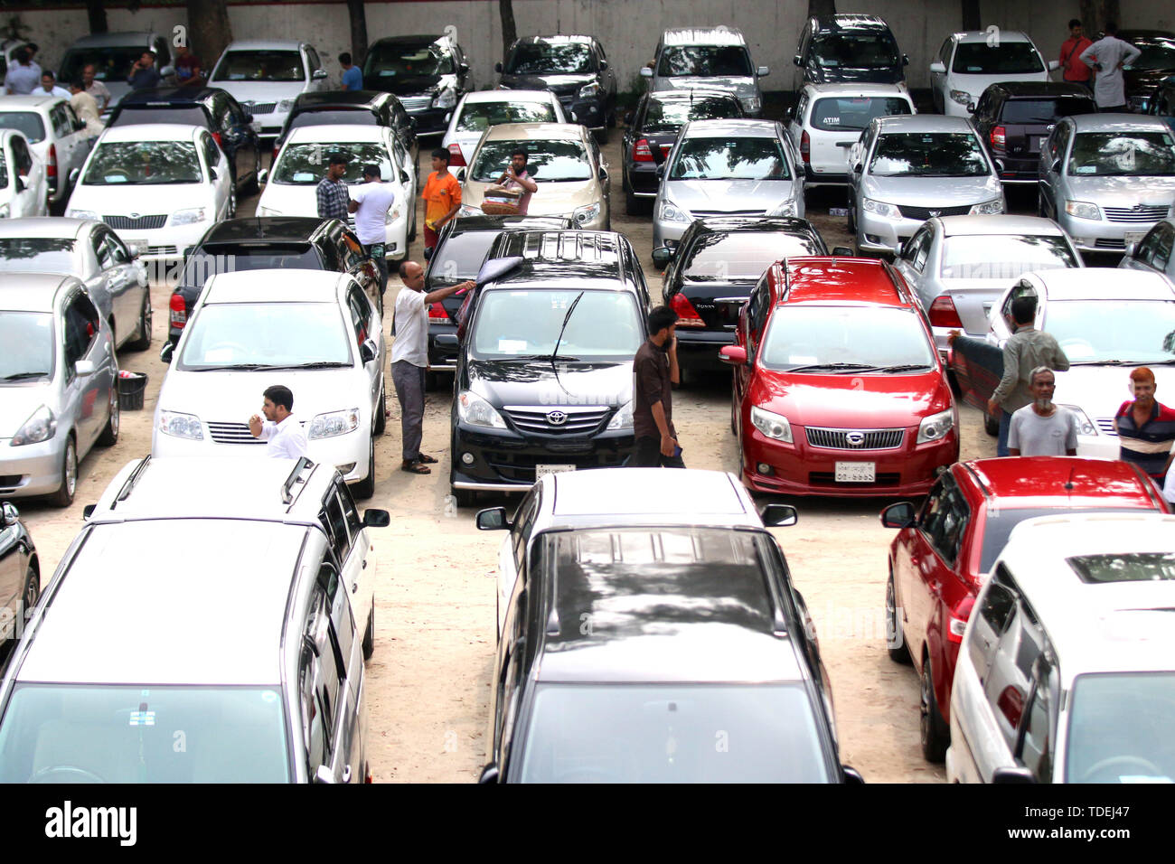 Dhaka, Bangladesh. 14th June, 2019. Cars for sale are being parked at ...