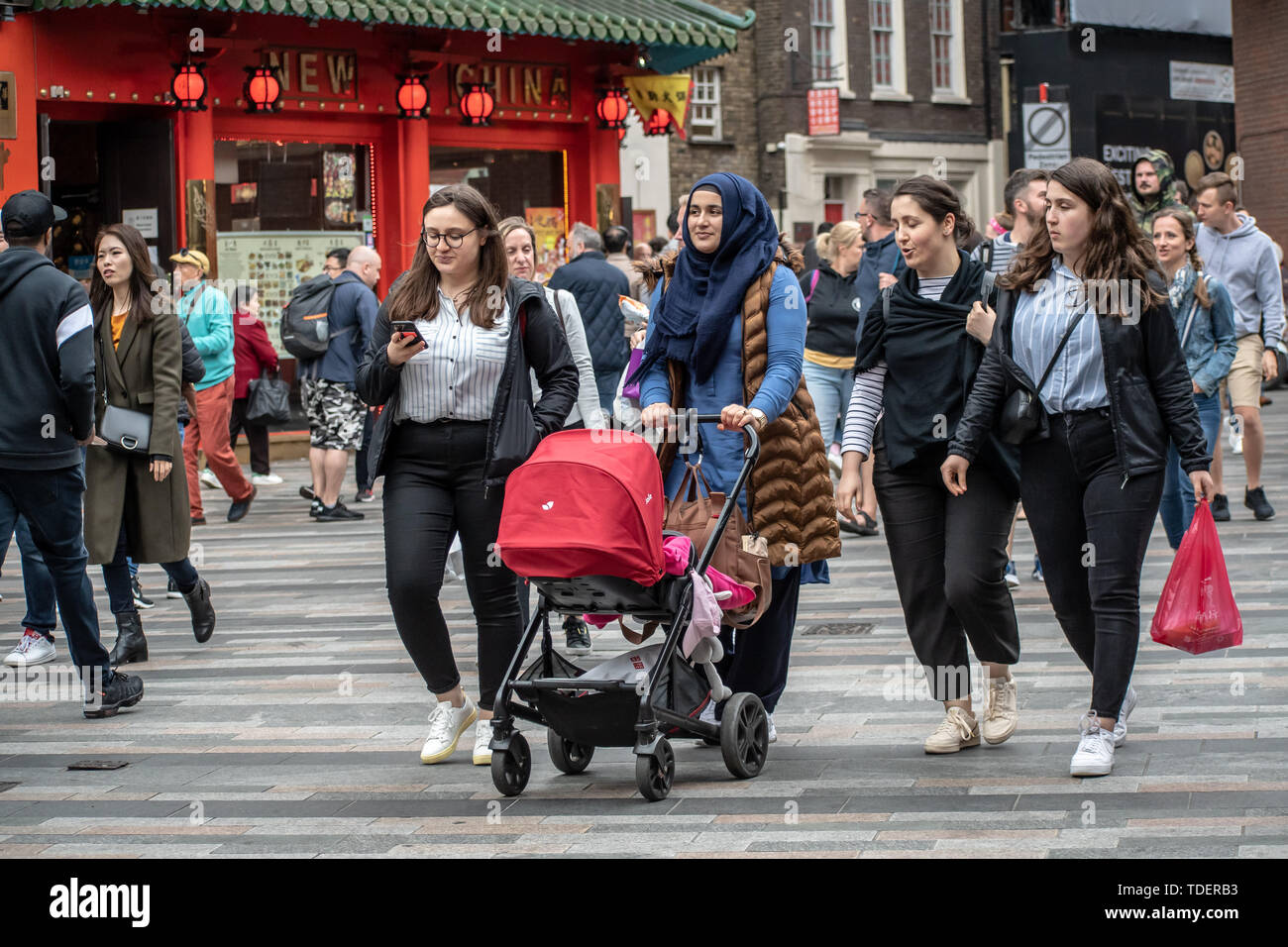 London, UK. London, UK. Tourists street photography in London Chinatown ...