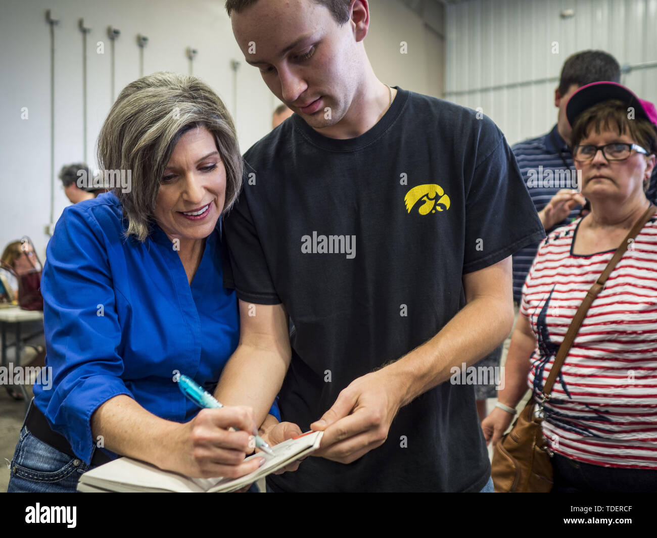 Boone, Iowa, USA. 15th June, 2019. US Senator JONI ERNST (R-IA) signs ...