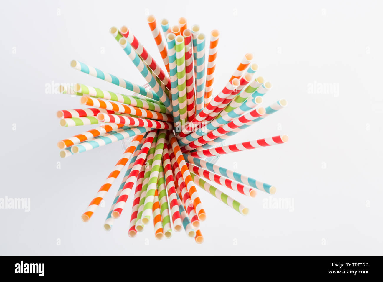 A brightly colored paper straw Stock Photo - Alamy