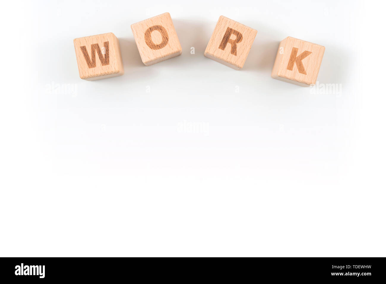 Work wooden blocks of business concept isolated on white background ...