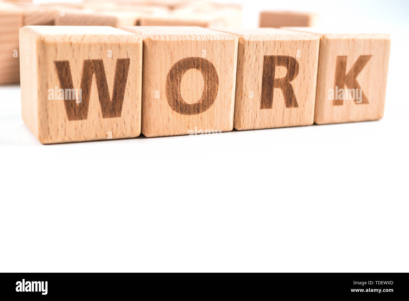 Work wooden blocks of business concept isolated on white background ...