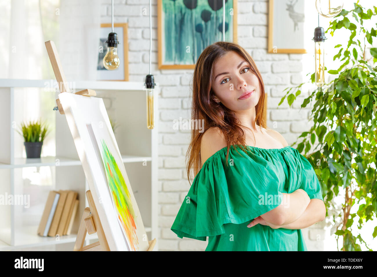Creative woman working in art studio Stock Photo - Alamy