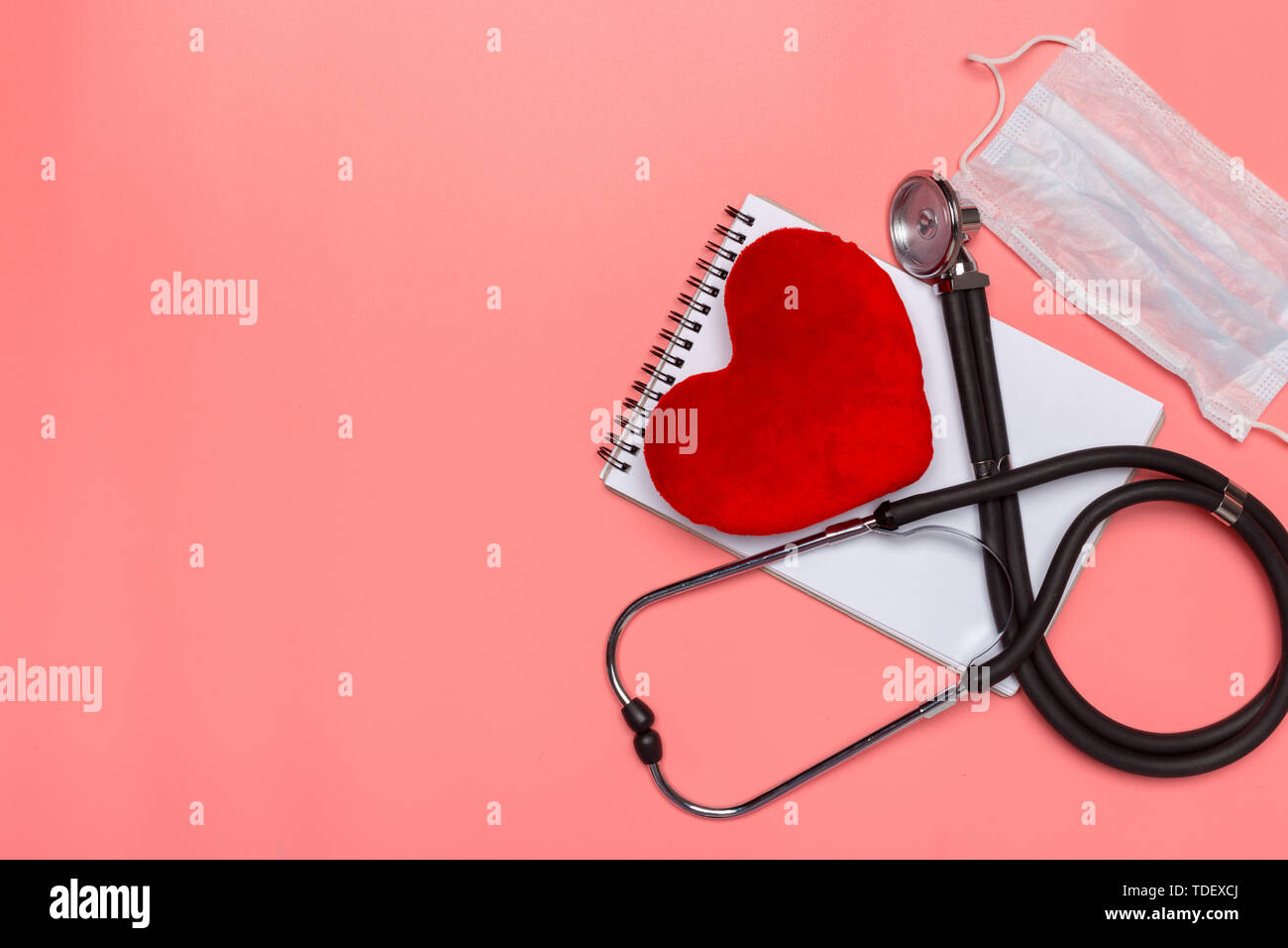 Medical equipment on a pink pastel background Stock Photo - Alamy