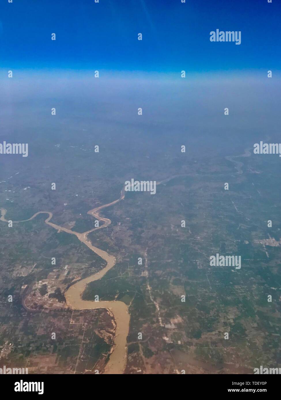 A set of high-altitude photos taken on a plane with a view of the ...