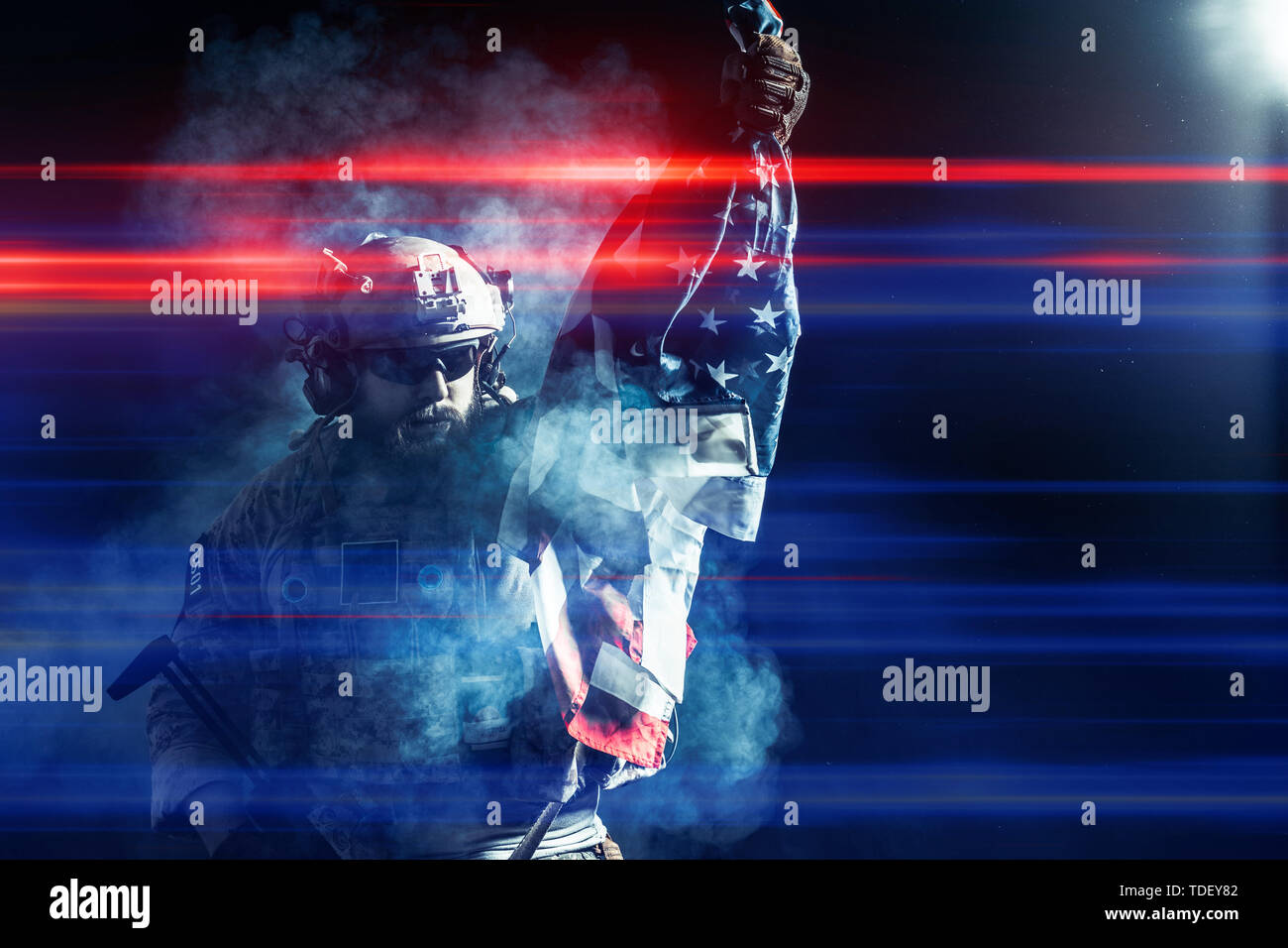 Soldier holding machine gun with national flag Stock Photo - Alamy