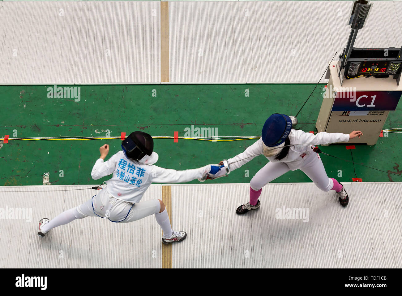 Fencing action hi-res stock photography and images - Alamy