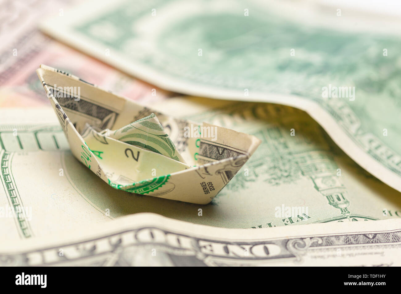 Money banknotes paper boats hi-res stock photography and images - Alamy