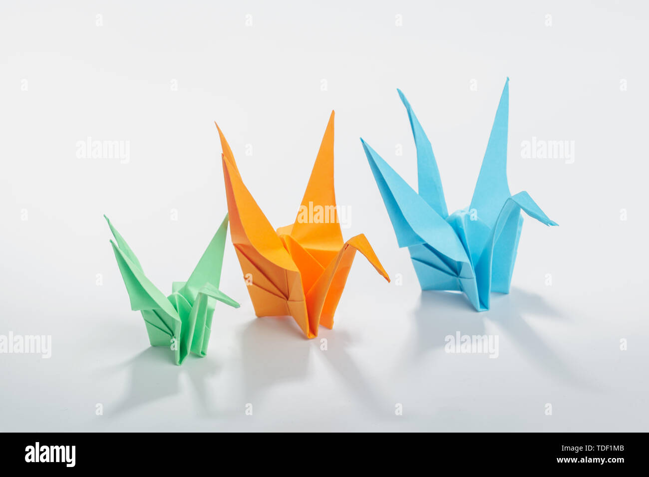origami crane on white background Stock Photo - Alamy