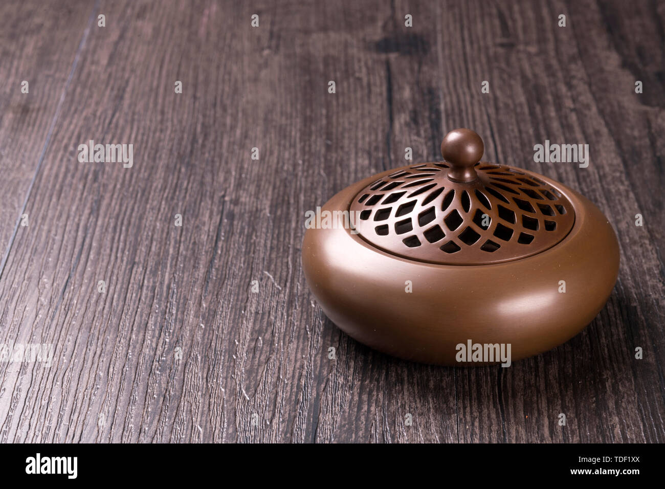 Copper incense stove Stock Photo - Alamy