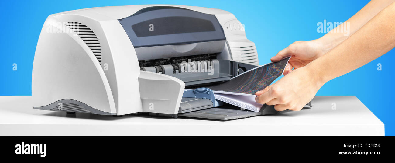 Printer copier machine on a bright colored background Stock Photo - Alamy