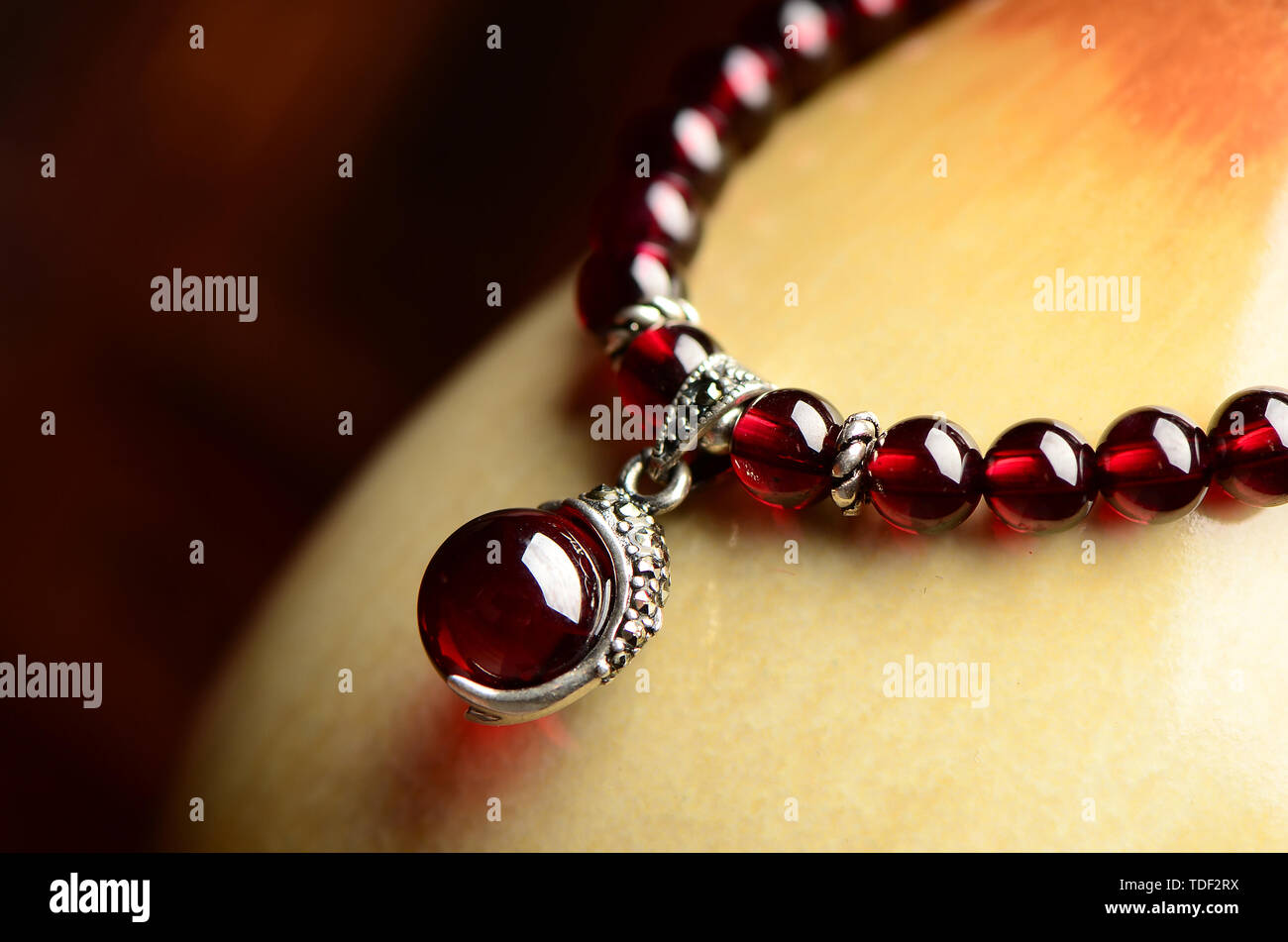 Garnet hand bracelet Stock Photo - Alamy