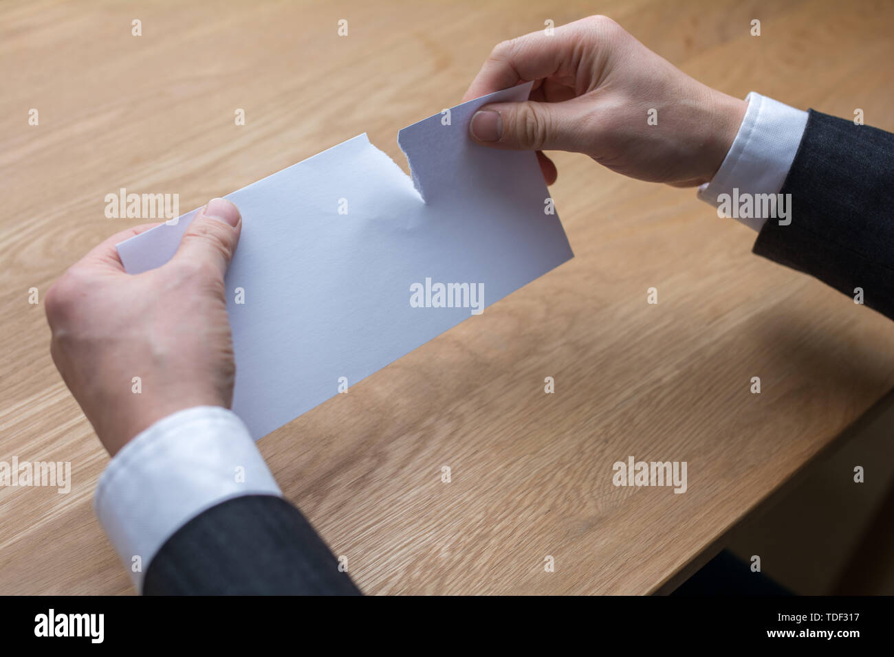 Poster tearing hi-res stock photography and images - Alamy