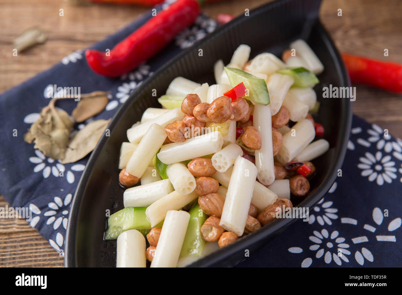 Lotus root pointed cucumber mixed with peanuts Stock Photo - Alamy