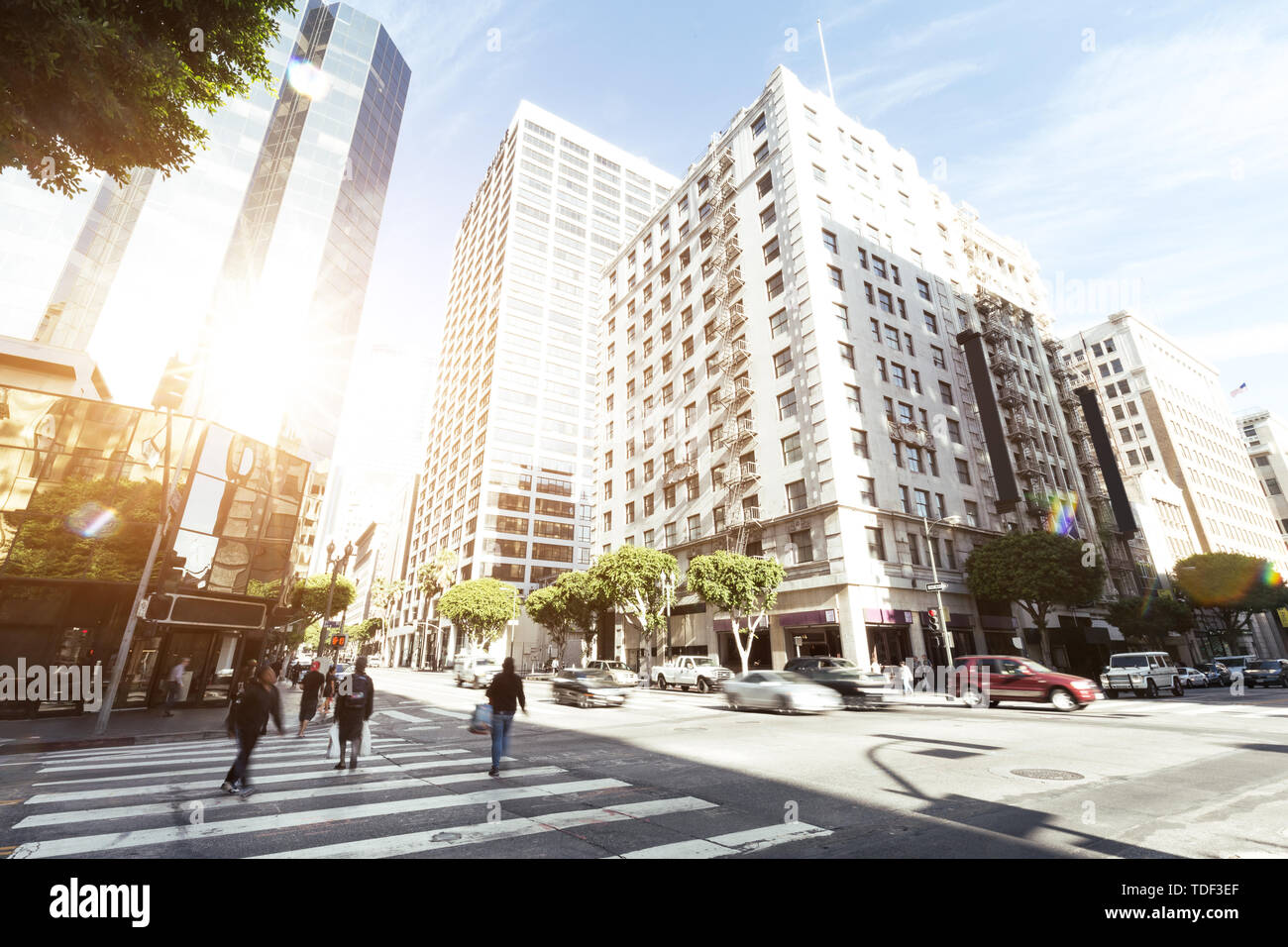 crowded people on road intersection in downtown of los angeles Stock ...