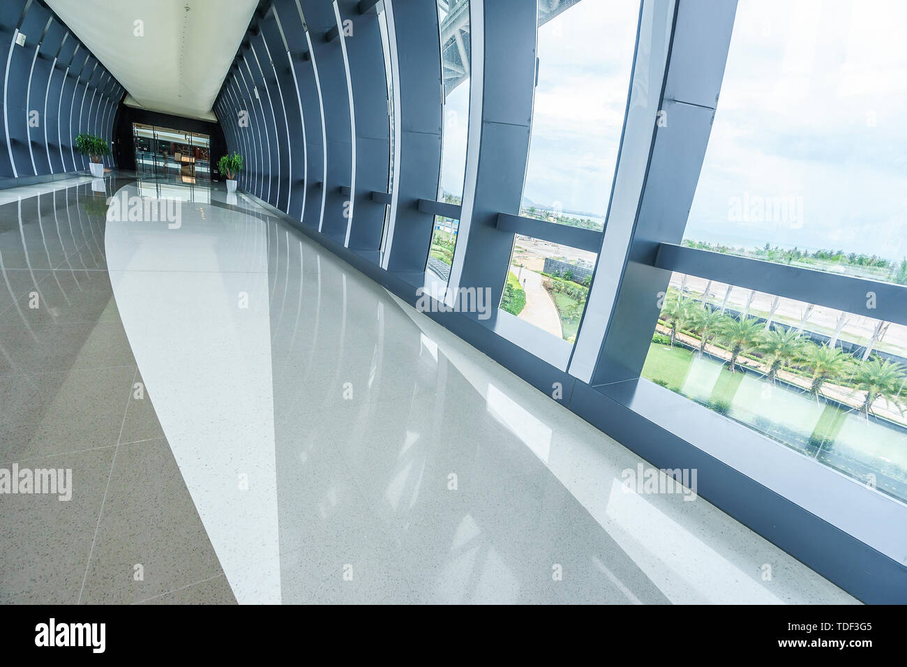 corridor with many glass windows in modern shopping mall Stock Photo ...