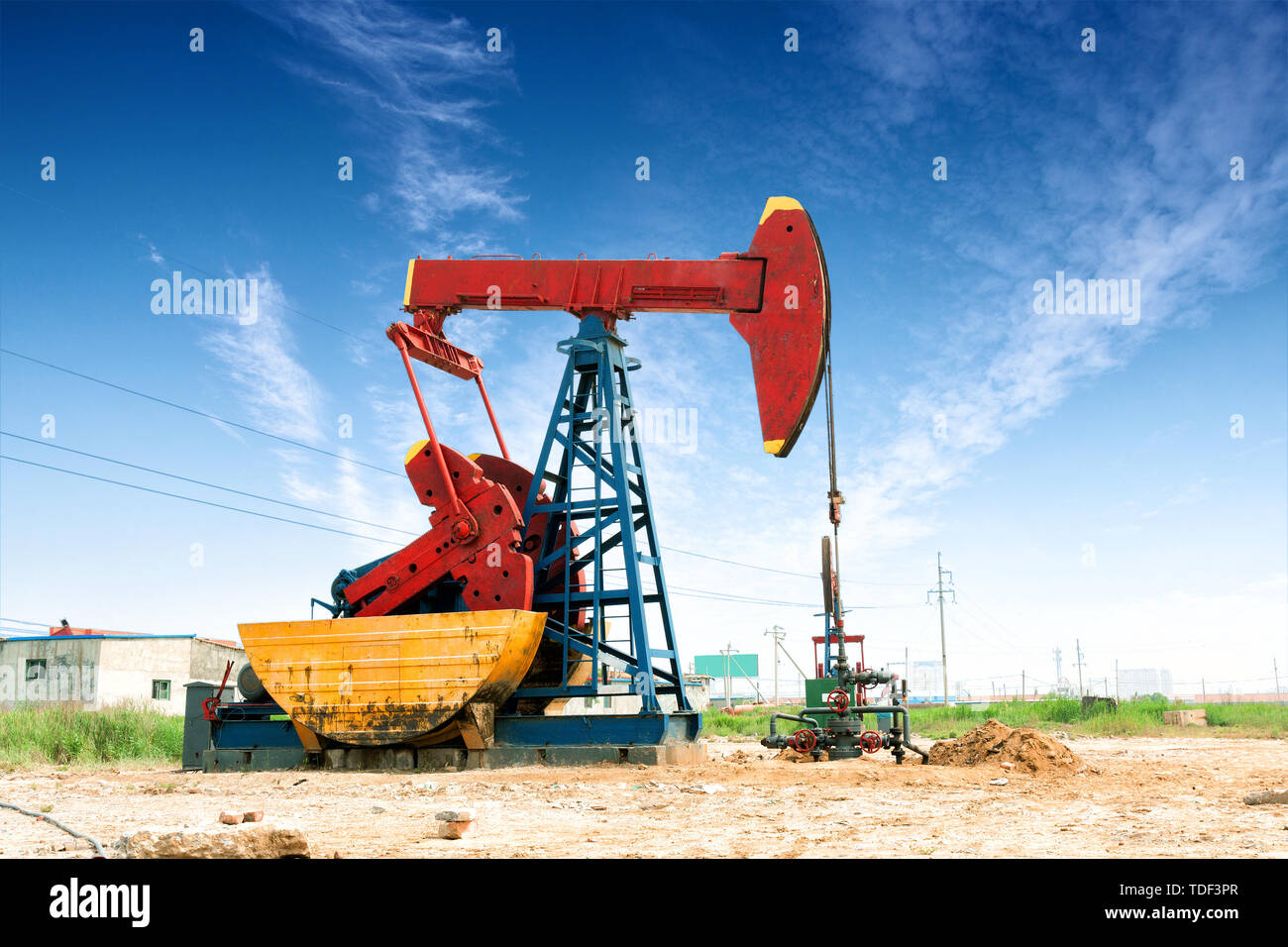 Oil well and bluesky Stock Photo - Alamy