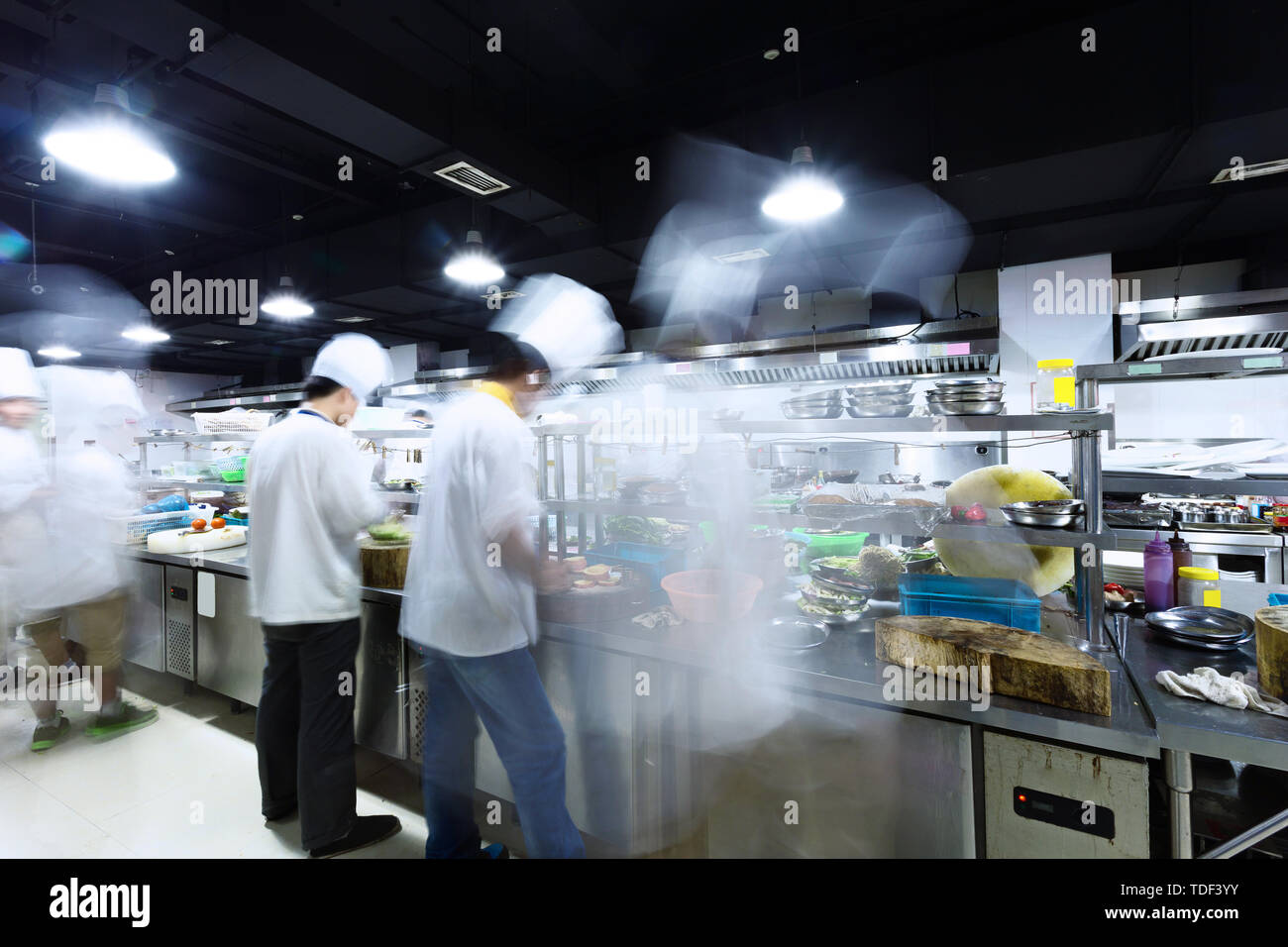 Modern and busy chefs Stock Photo - Alamy
