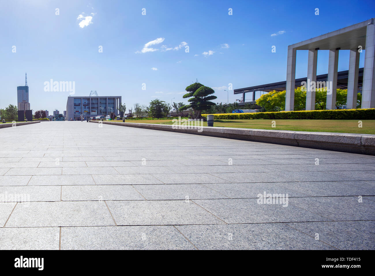 long empty footpath in modern city square with skyline Stock Photo - Alamy