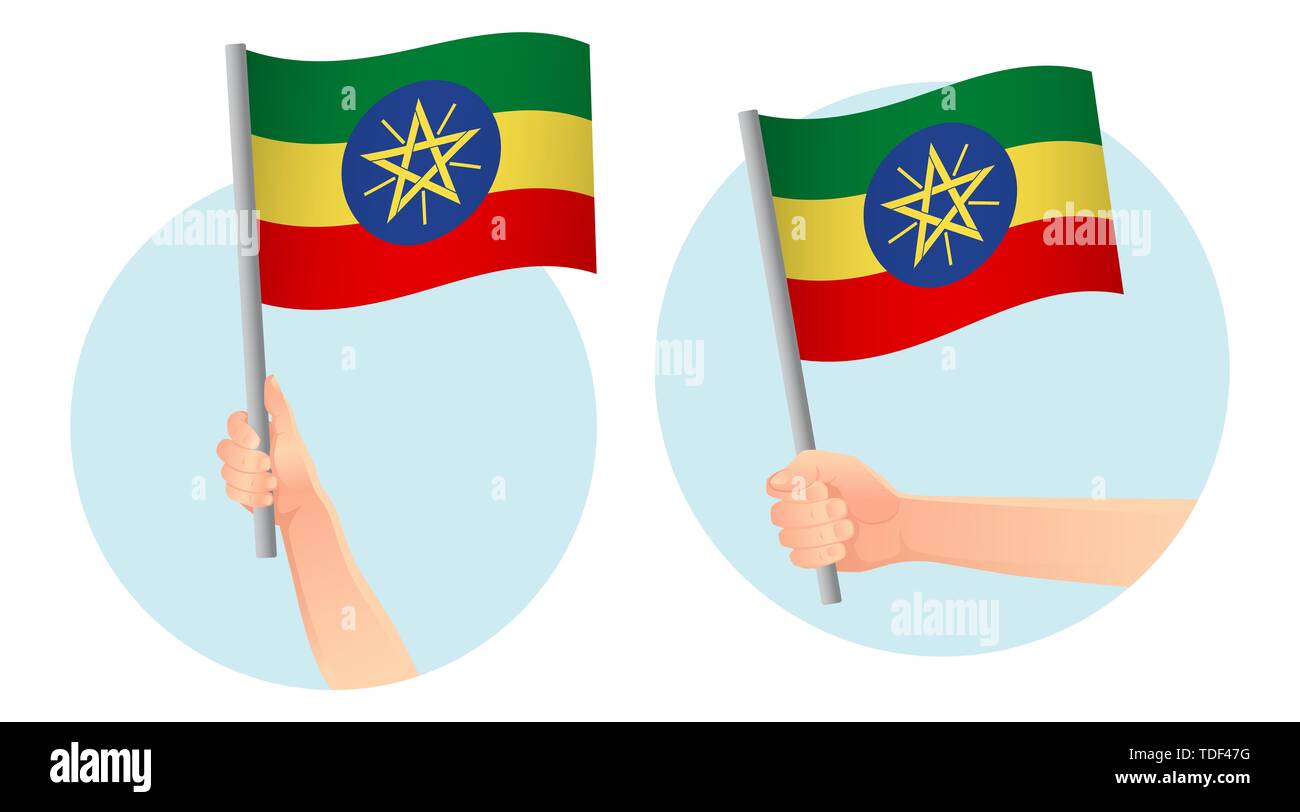 Ethiopia flag in hand. Patriotic background. National flag of Ethiopia ...