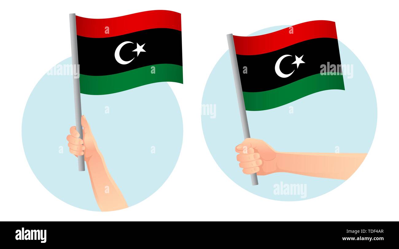libya flag in hand. Patriotic background. National flag of libya ...