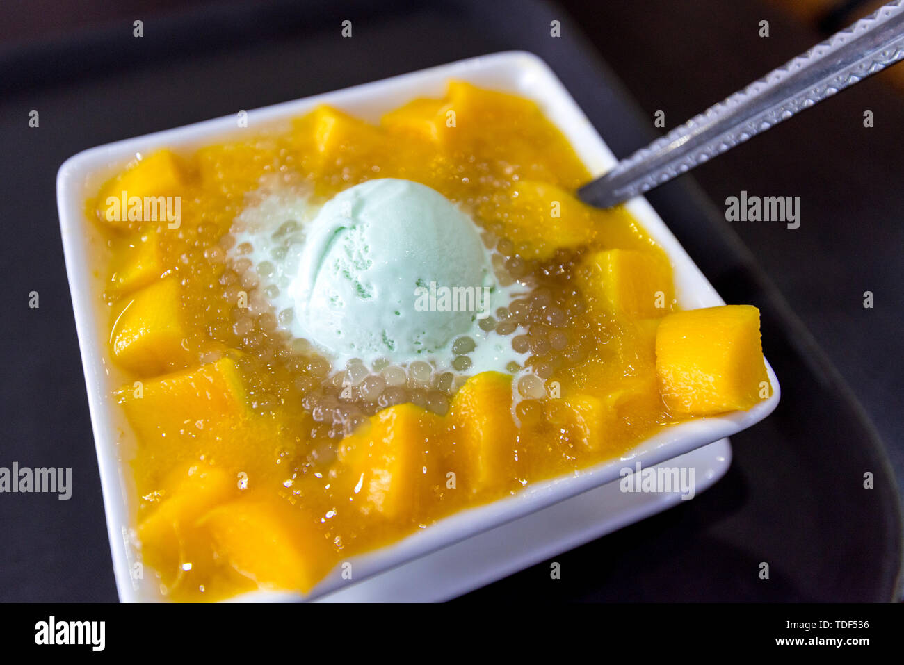 Mango vanilla ice cream Similu Stock Photo - Alamy