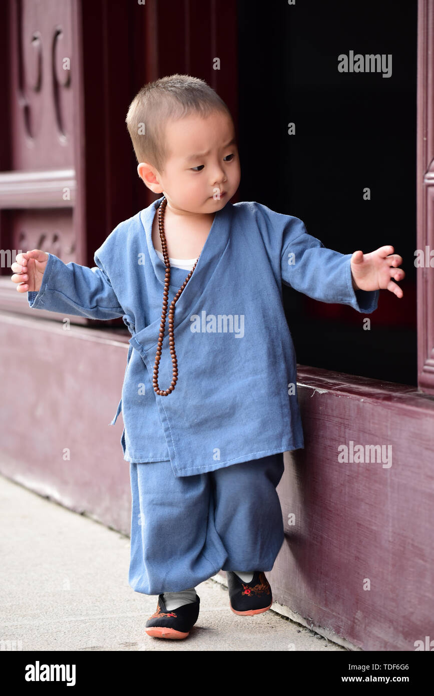 Cute little monk, children's photography Stock Photo - Alamy