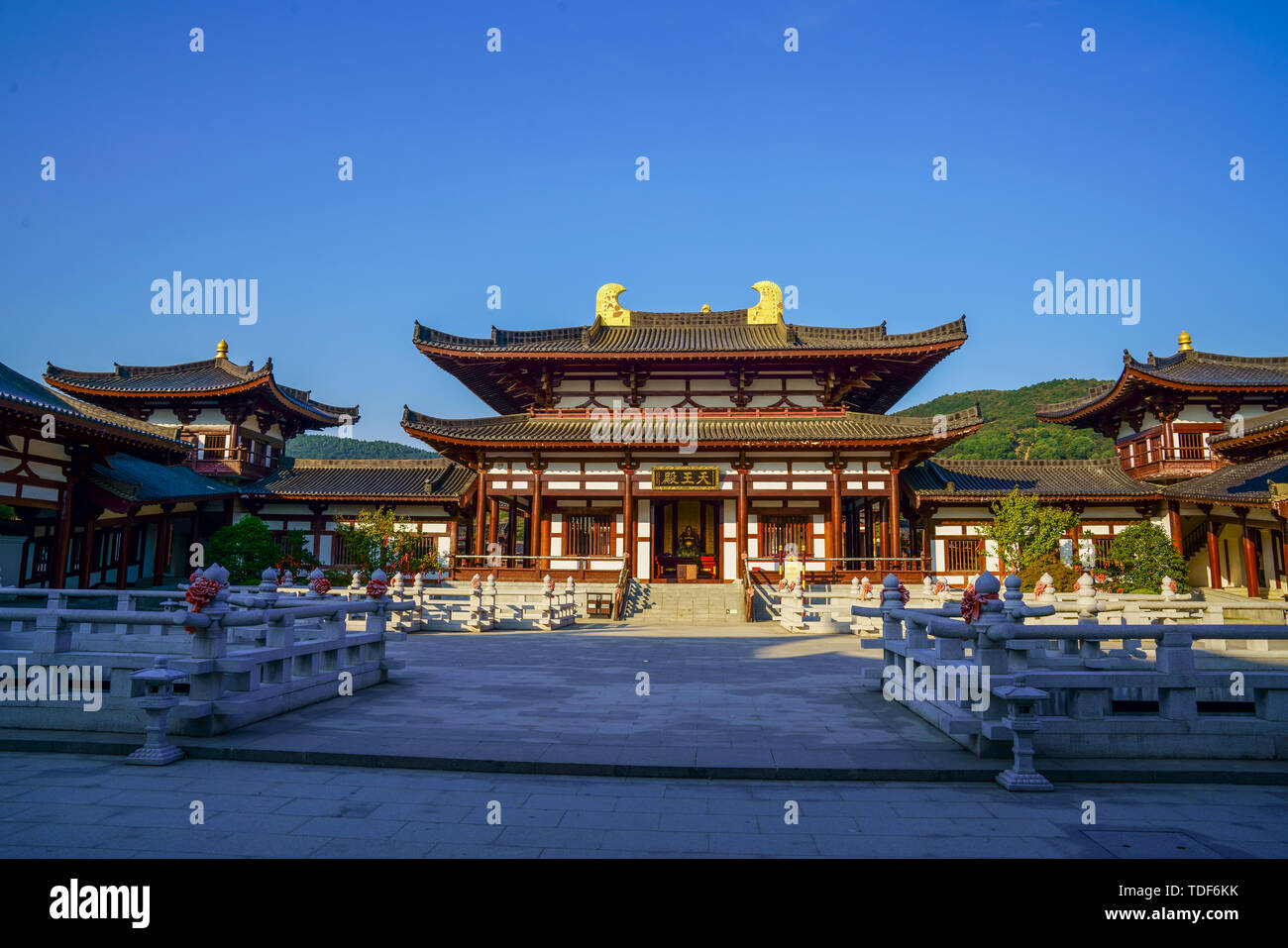 Sun light ancient trees and roofs hi-res stock photography and images ...