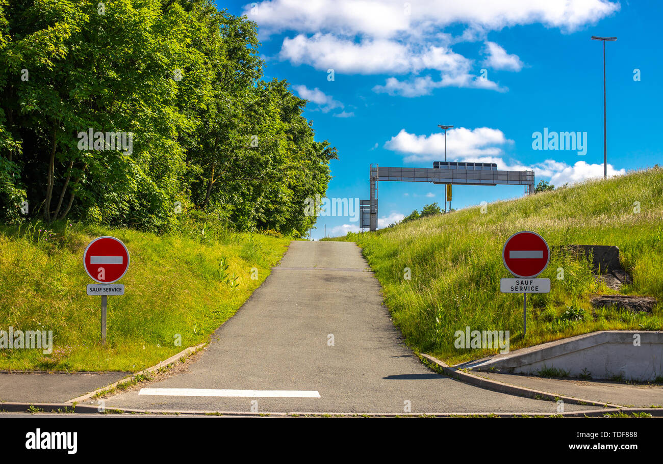 Road sign do not enter. There is no entry to that side. The road goes ...