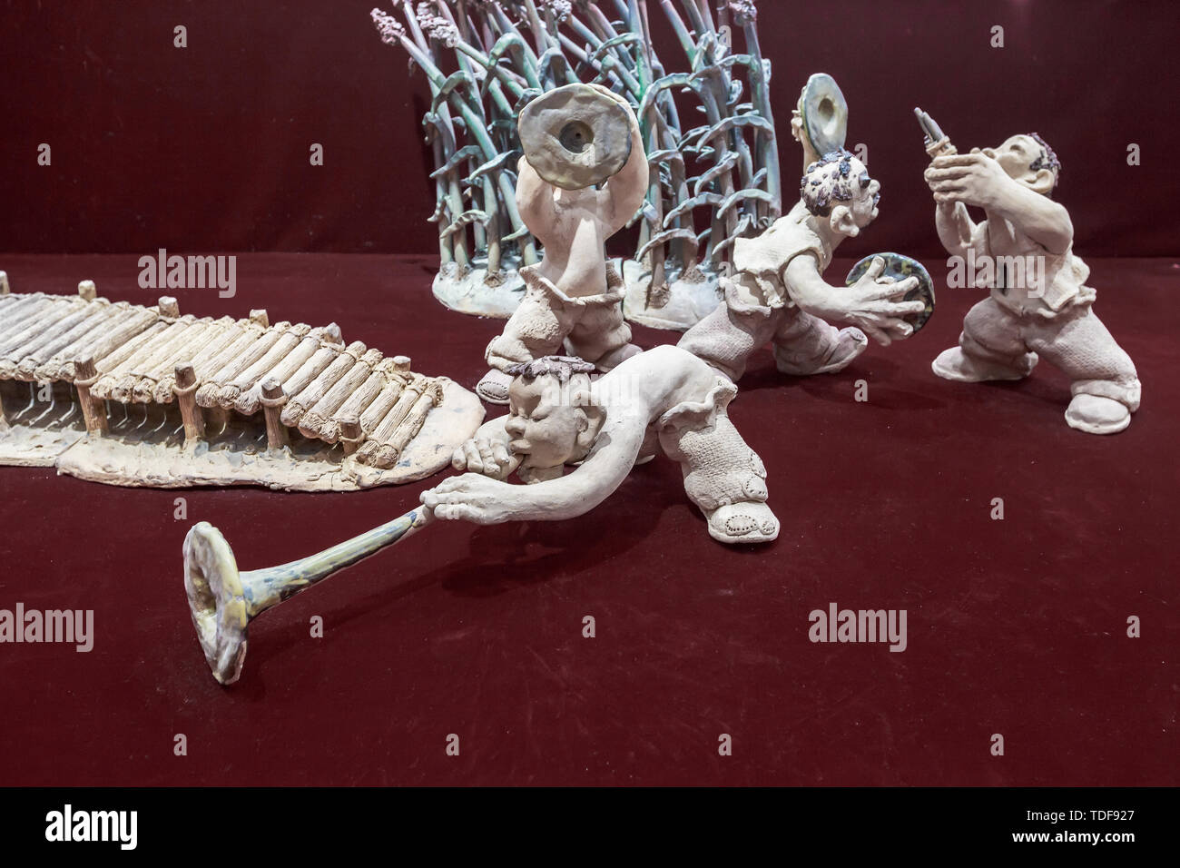 Folk life scene mud sculpture Stock Photo - Alamy