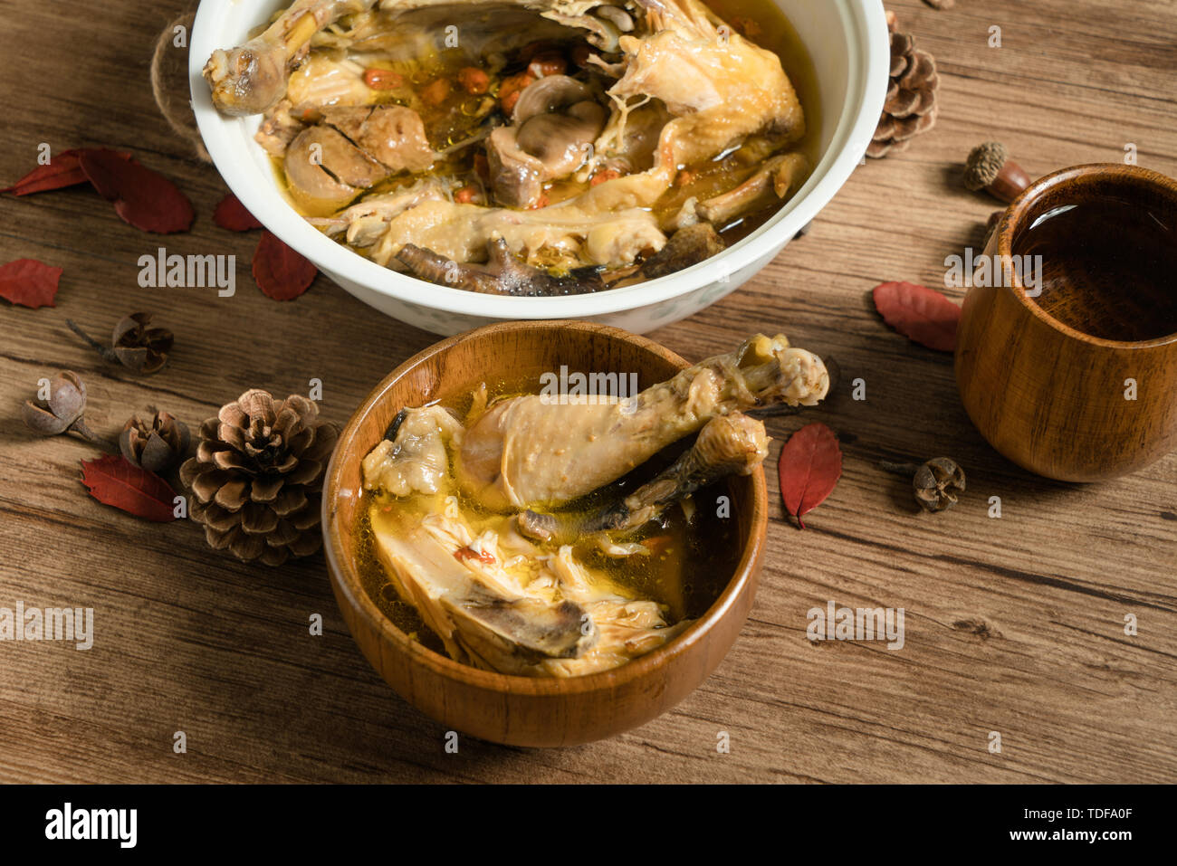 Chicken soup with wood pattern background Stock Photo - Alamy
