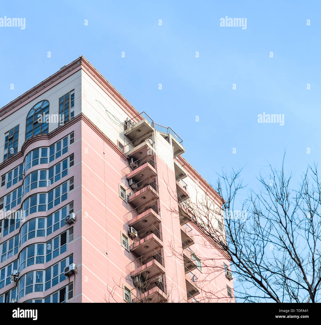 A staircase outside a wall outside high-rise building in winter Stock ...