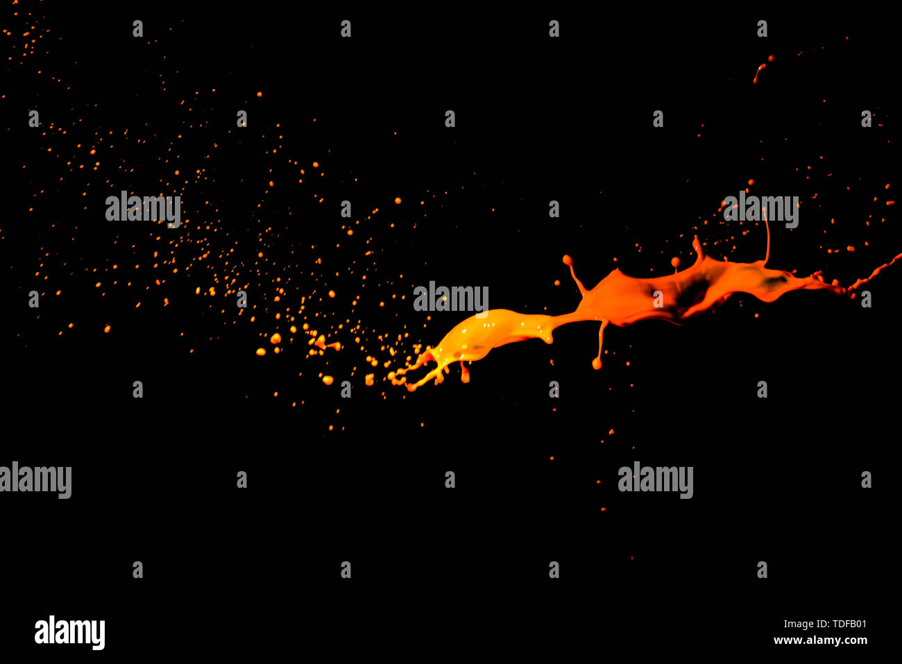 isolated orange water splash on background Stock Photo - Alamy