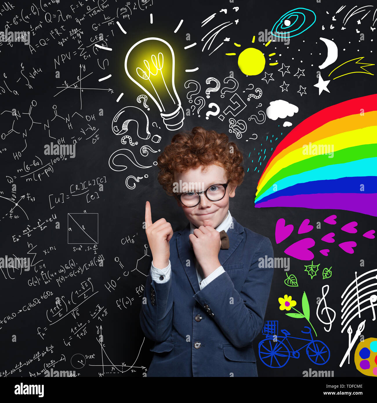 Cute child boy thinking and pointing up on lightbulb. Brainstorming and ...