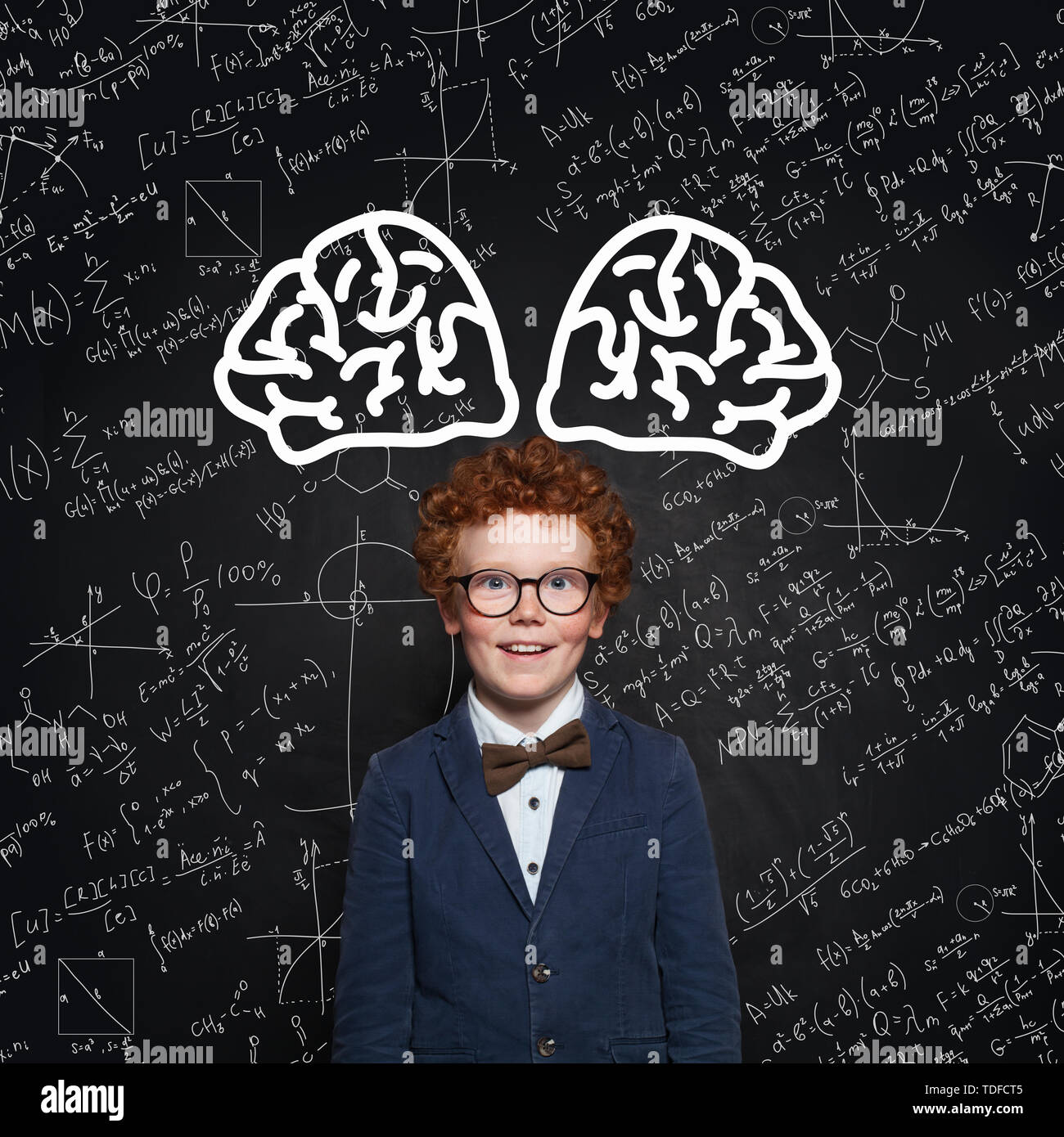 Happy child learning science. Redhead kid on background with science ...