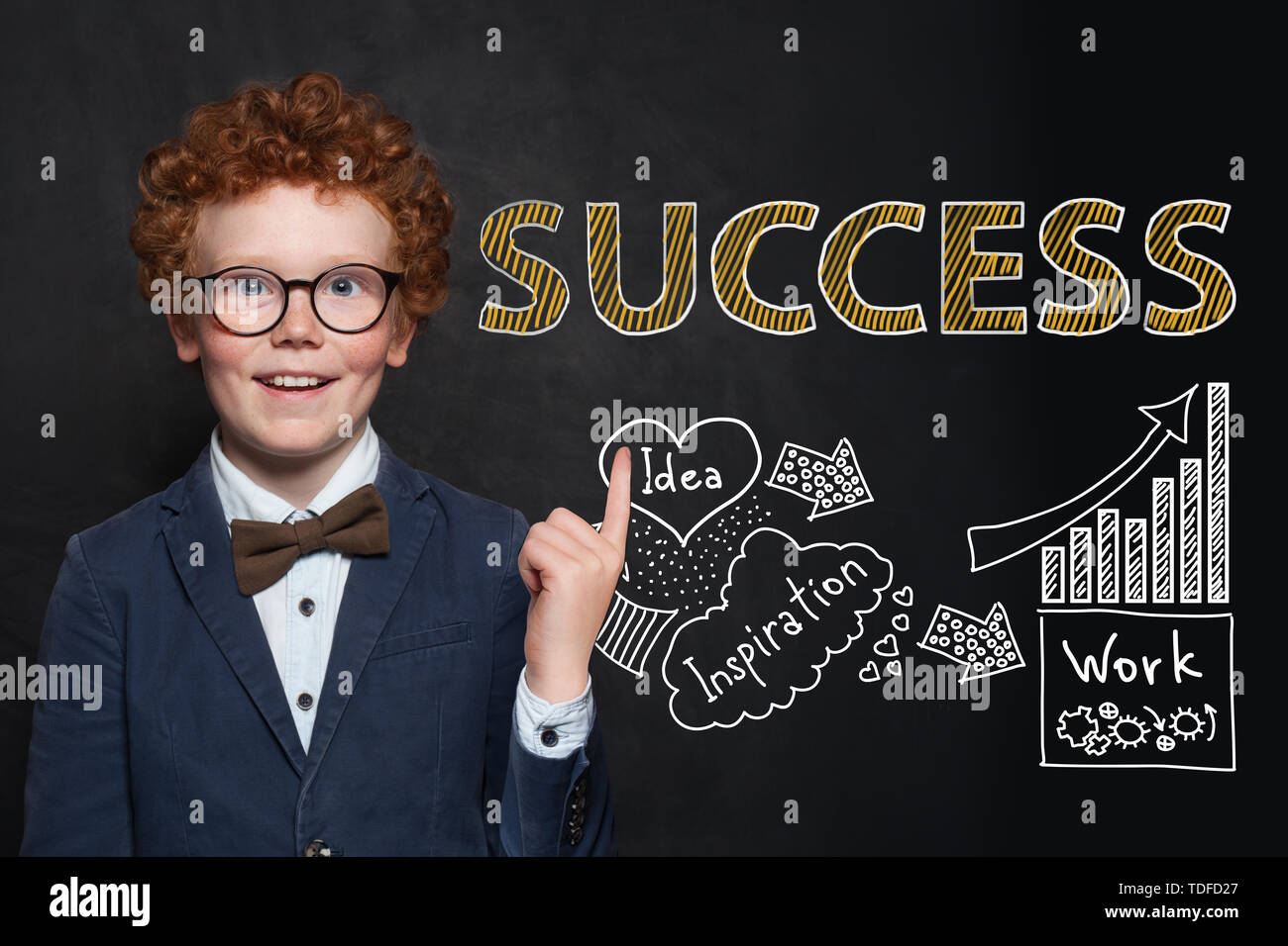 Smart child boy with hand drawing sketch and success text. Business ...